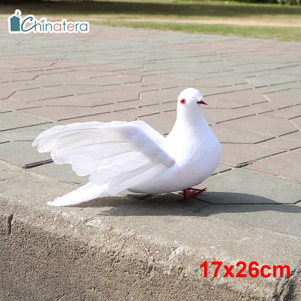 Artificial doves for wedding | Beachweddingtips.com